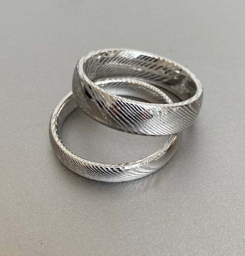 Sophisticated Damascus Steel Wedding Ring Set with Wood Case | Inspire ...