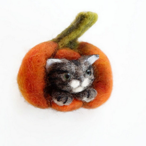 A cat in a pumpkin brooch for Halloween - Inspire Uplift