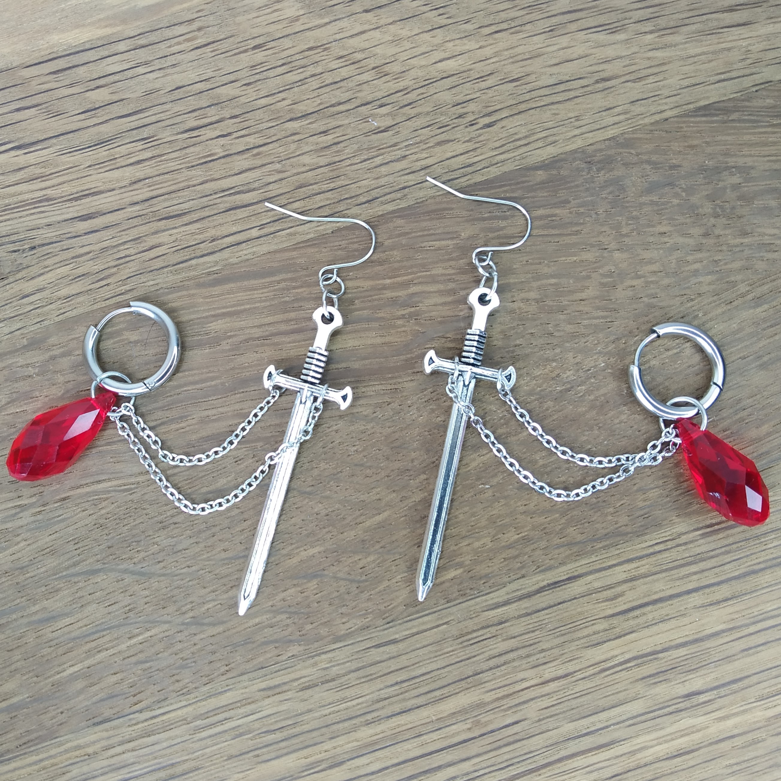 Single sword earring with red crystal. Double piercing anime - Inspire ...