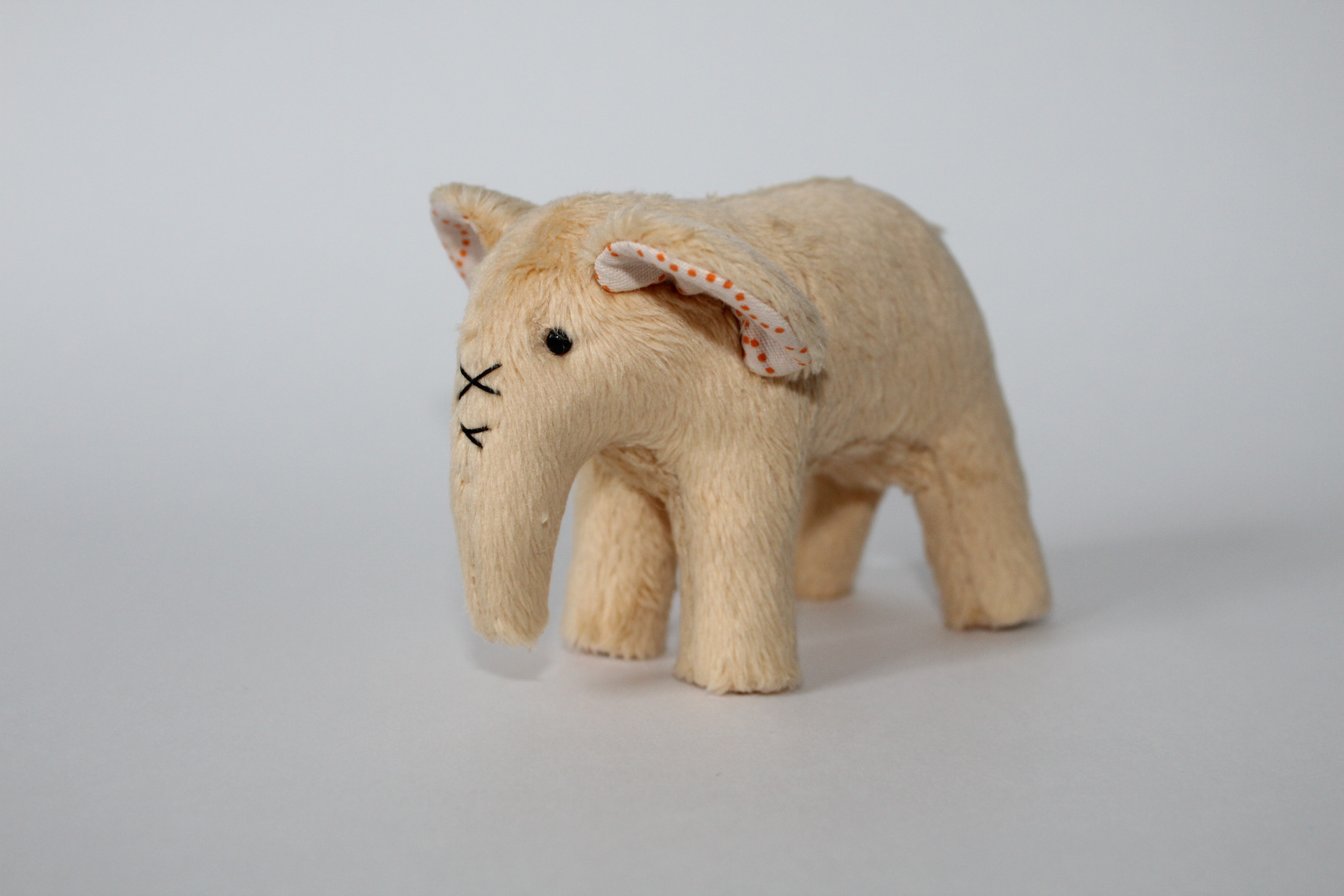Teddy elephant. Cute light yellow miniature elephant. Mini | Inspire Uplift