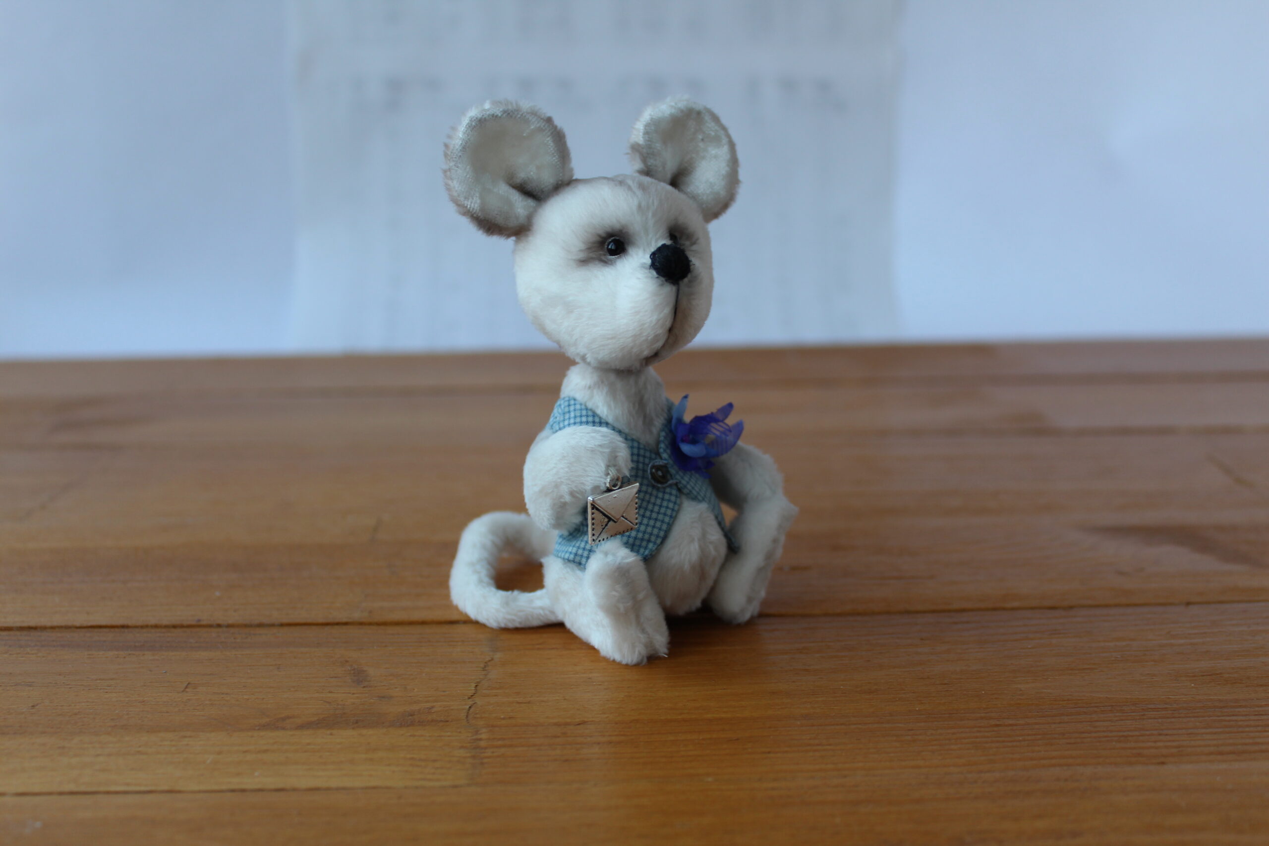 Little white teddy mouse in a vest. Stuffed teddy mouse. | Inspire Uplift