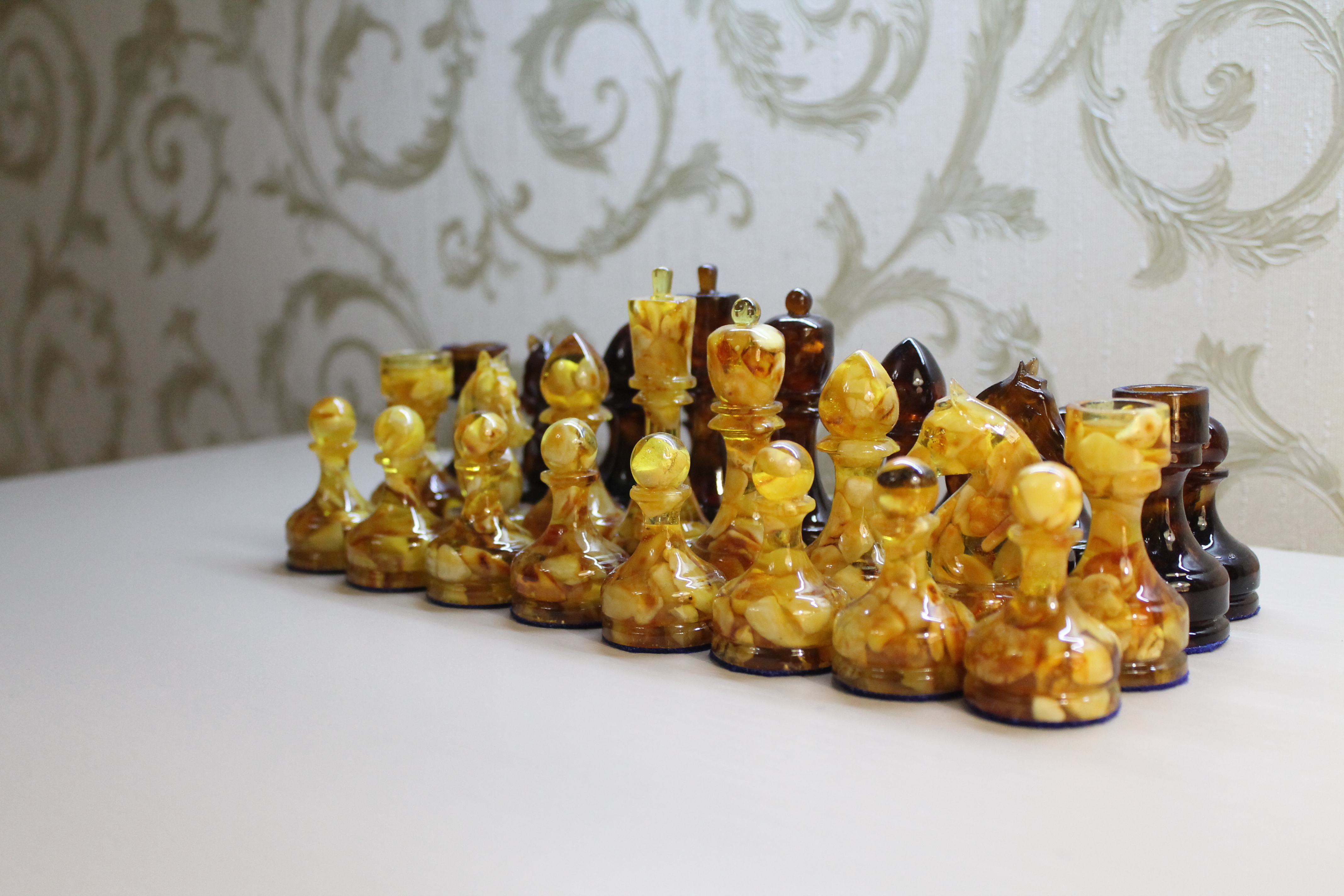 Handmade chess pieces made of amber | Inspire Uplift