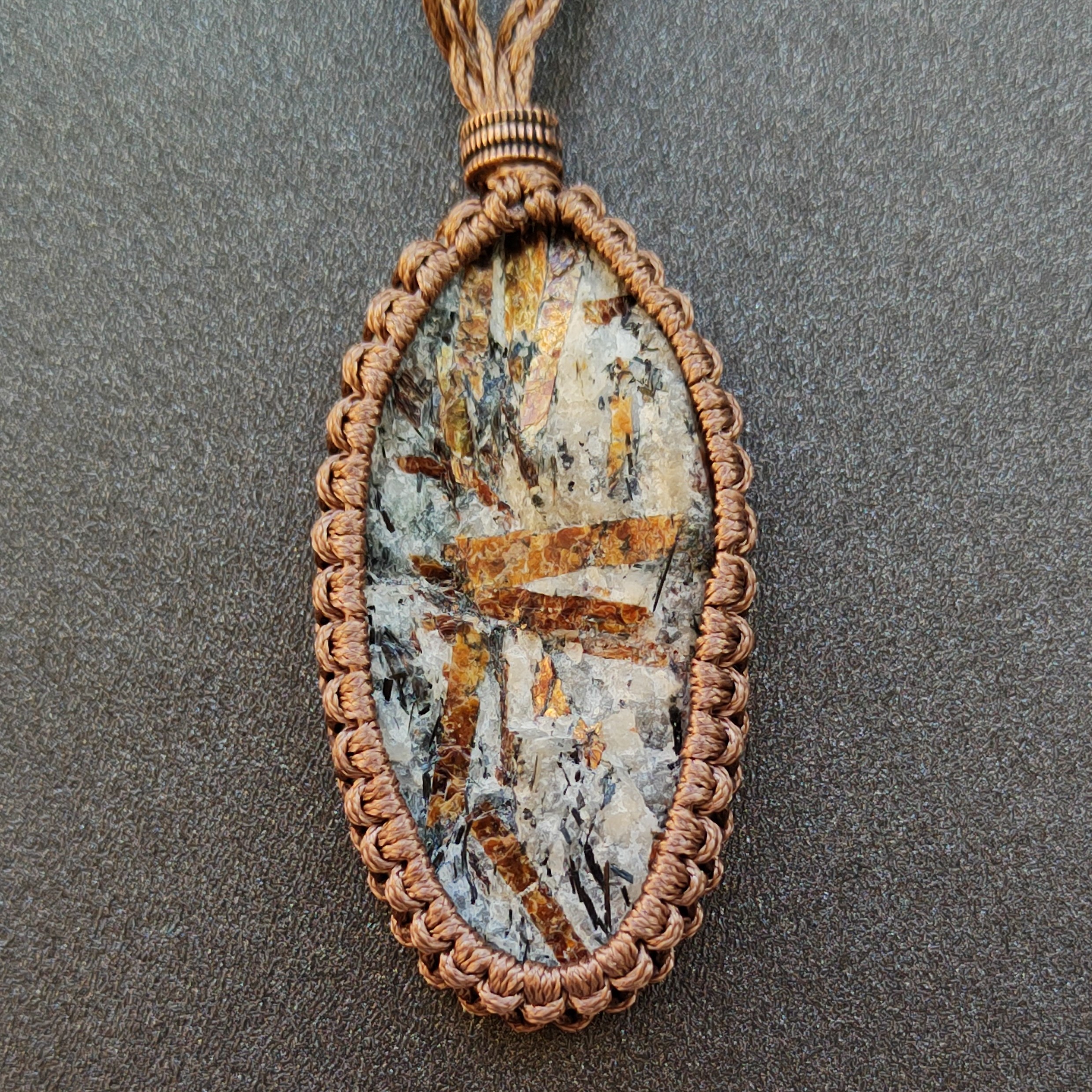 Raw ASTROPHYLLITE in feldspar-aegirine breed pendant - Inspire Uplift