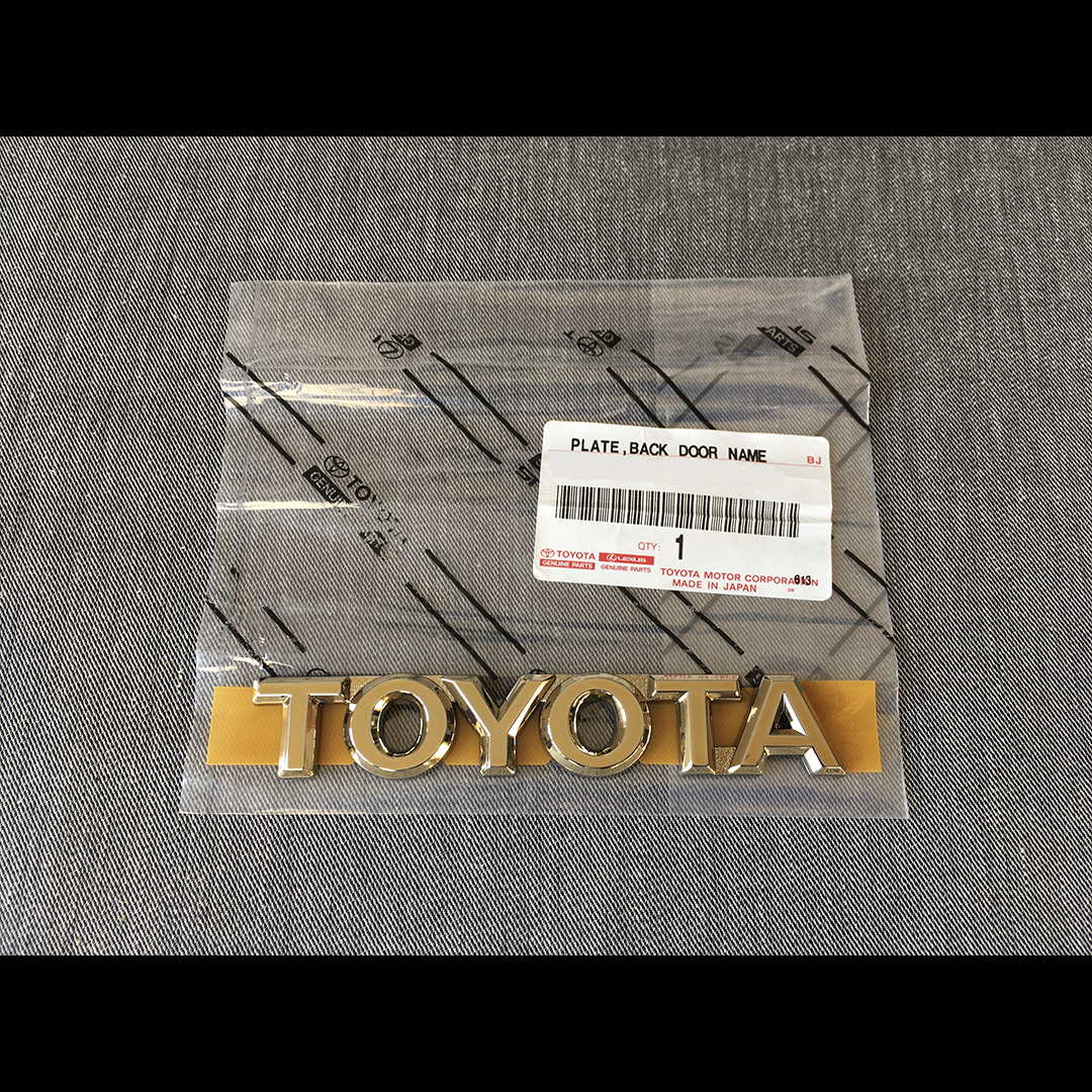 Toyota Genuine Gold Rear Emblem Badge for Land Cruiser 100 | Inspire Uplift