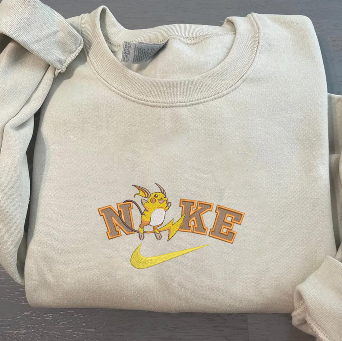 Raichu Nike Embroidered Crewneck, Pokemon Embroidered Sweats - Inspire ...