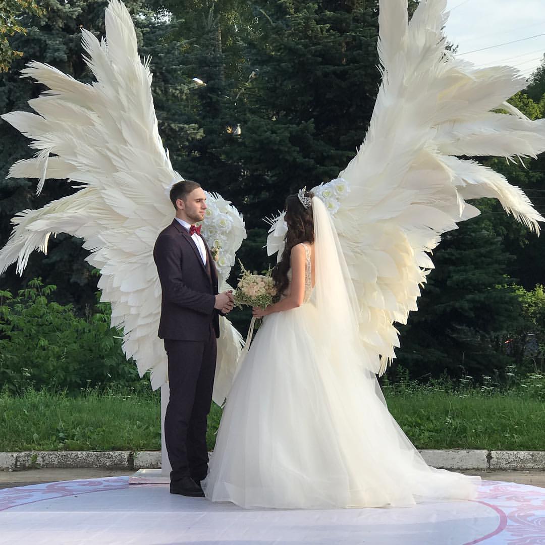 Giant angel wings wedding backdrop on metal stand, event pro | Inspire ...