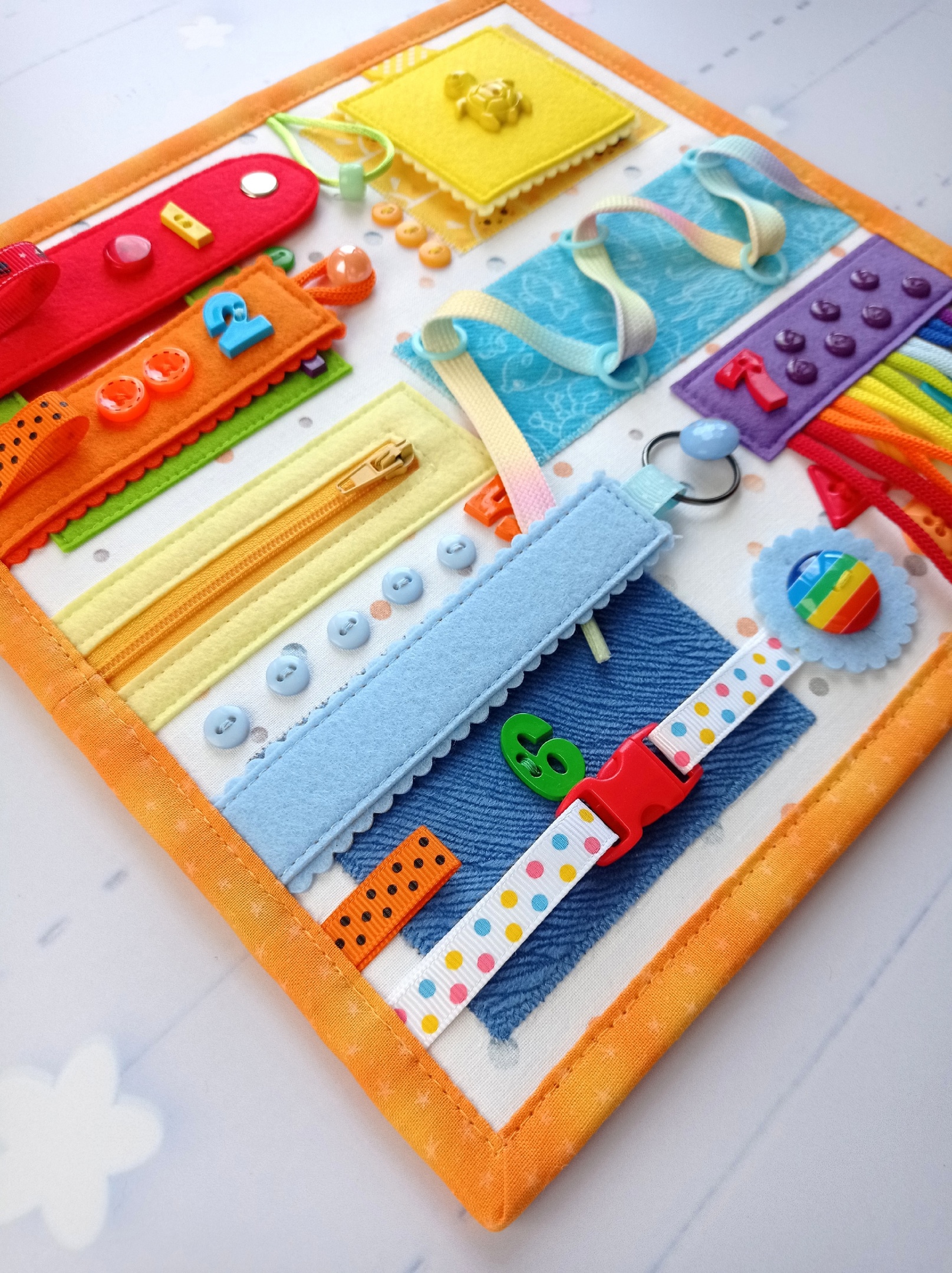 Rainbow tablet ,Sensory busy board Autism, Lap blanket quilt - Inspire ...