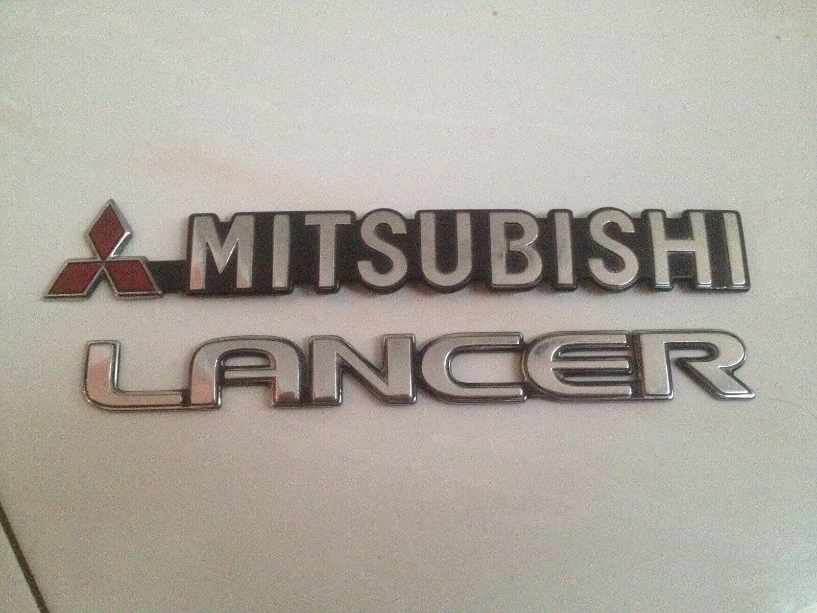Lancer Car Emblem Set | Inspire Uplift