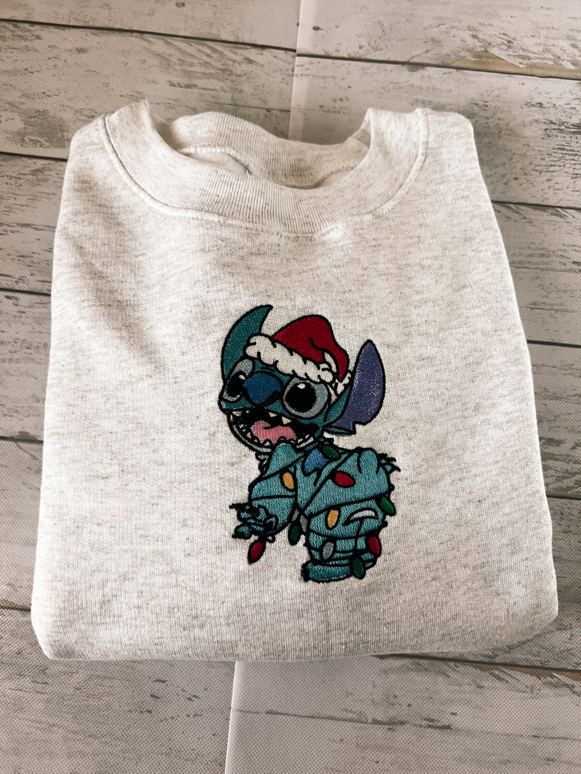 Santa Stitch With Christmas Lights Disney Embroidered Sweats - Inspire ...