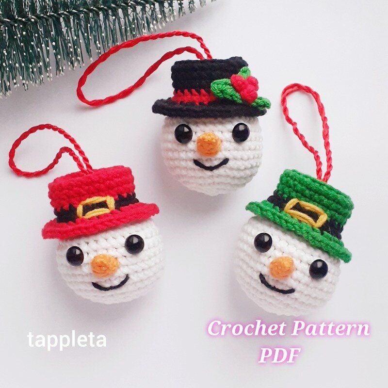 Snowman baubles with hats crochet pattern, Amigurumi snowman | Inspire ...